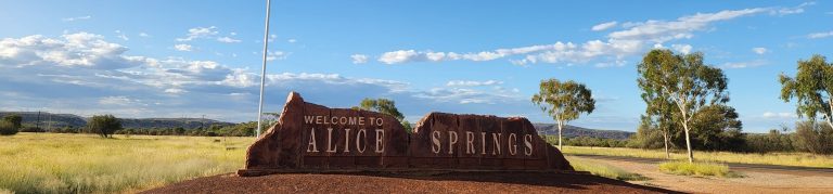 Where do you stop between Ayers Rock and Alice Springs?